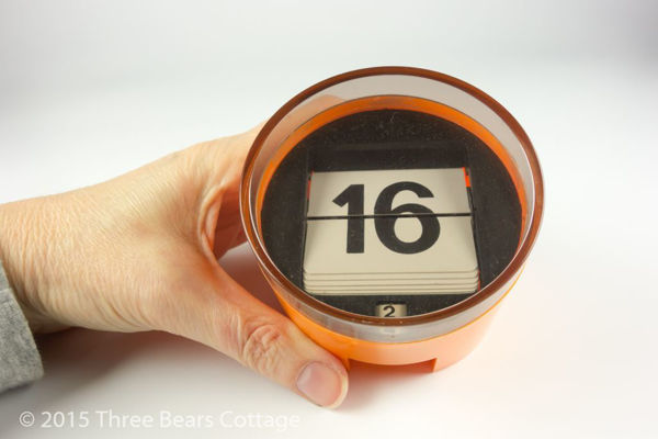 Circular Orange Plastic Perpetual Desk Calendar at 3bc Vintage Shop